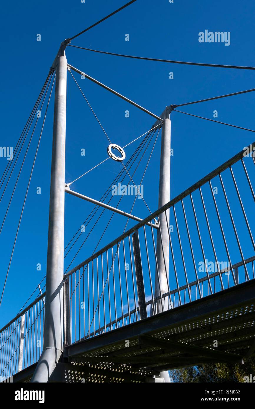 Modern suspension bridge on walking and cycling track over Waikanae ...