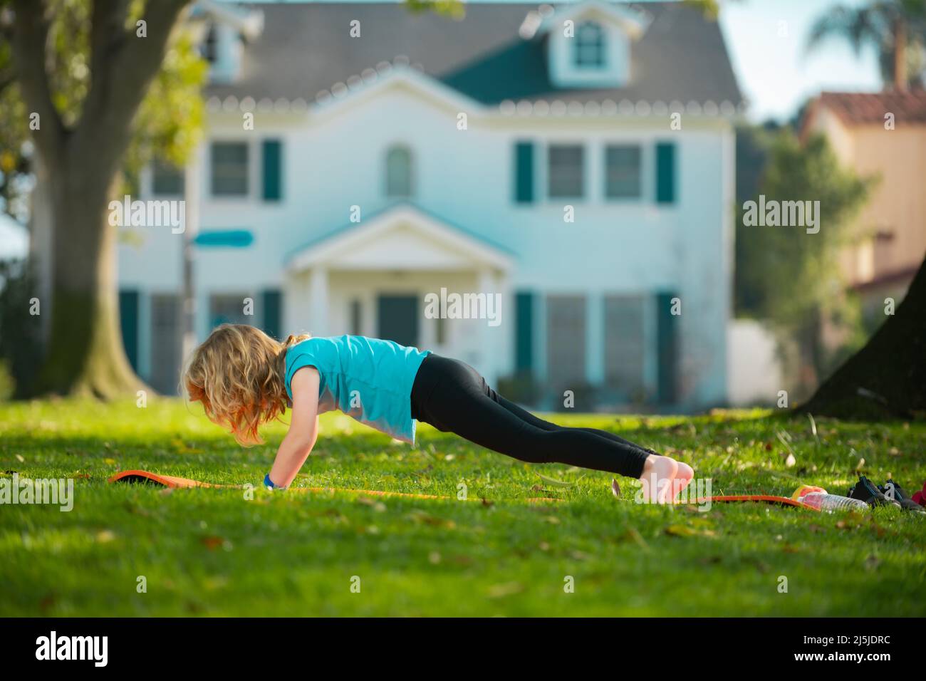 Boy is doing push up exercise. Gym workout. Child sportsman, childhood ...
