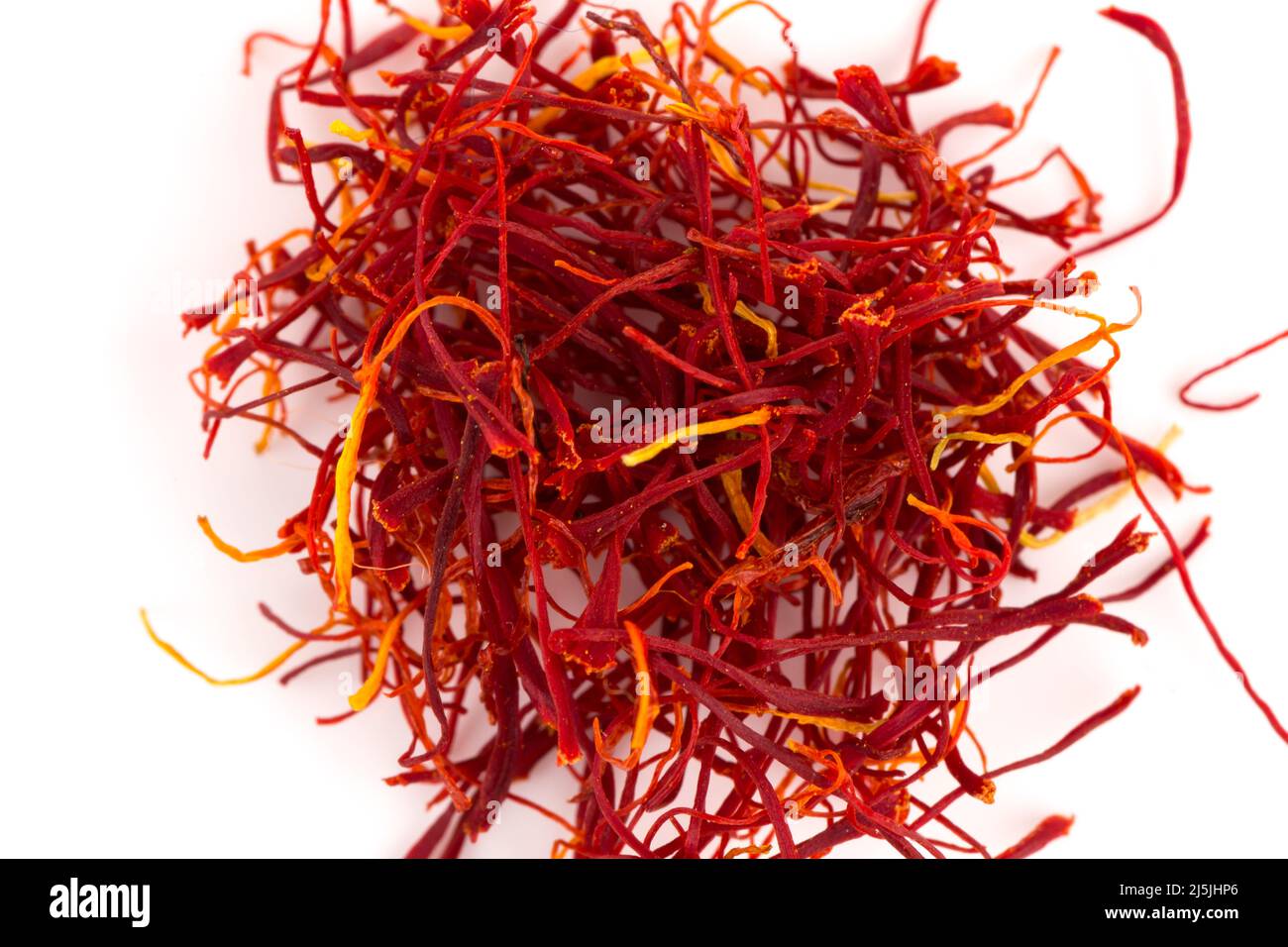 Dried saffron spice isolated on a white background Stock Photo - Alamy