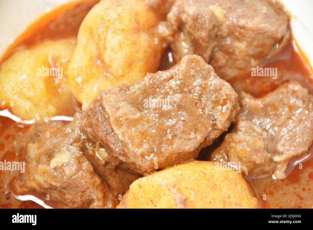 beef meat massaman curry with slice potato and onion in bowl Stock ...