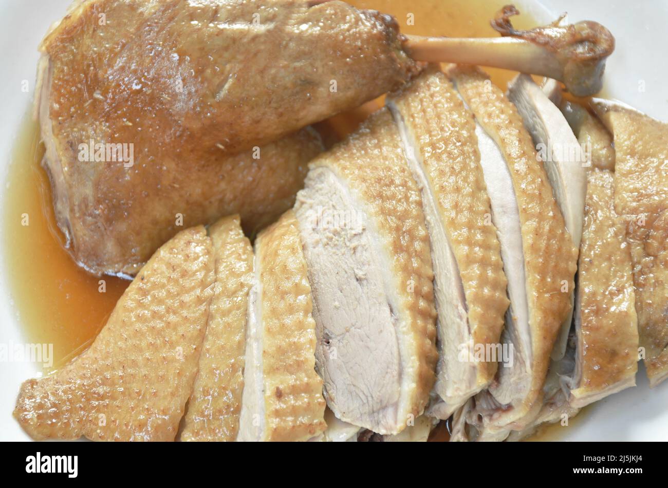 boiled duck meat dressing black soybean sauce chop and arranging on ...