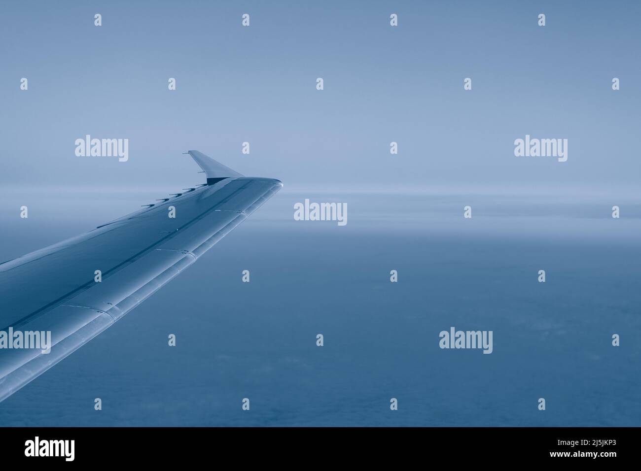 Aircraft wing in flight . View from flying plane Stock Photo - Alamy