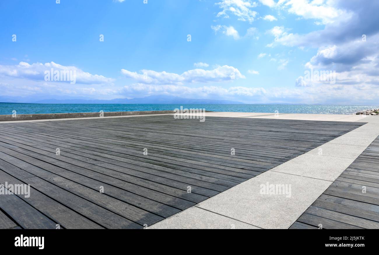 Plank square floor and lake with sky cloud landscape Stock Photo - Alamy