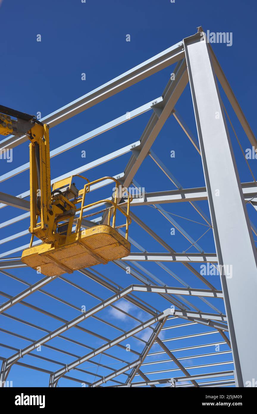 detail of a yellow elevating platform for construction in the ...