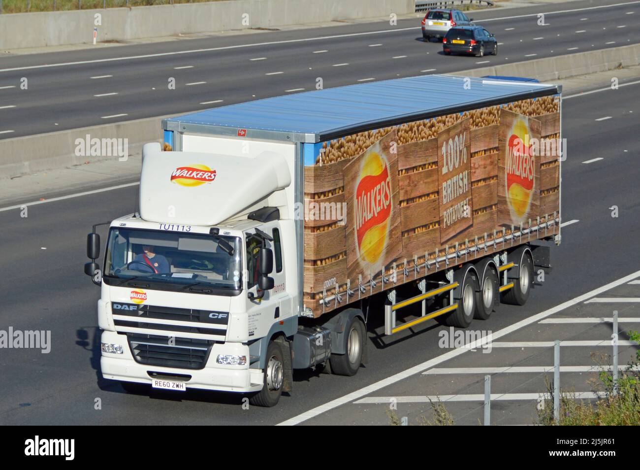 Side front view Walkers potatoes snack food crisp making business ...