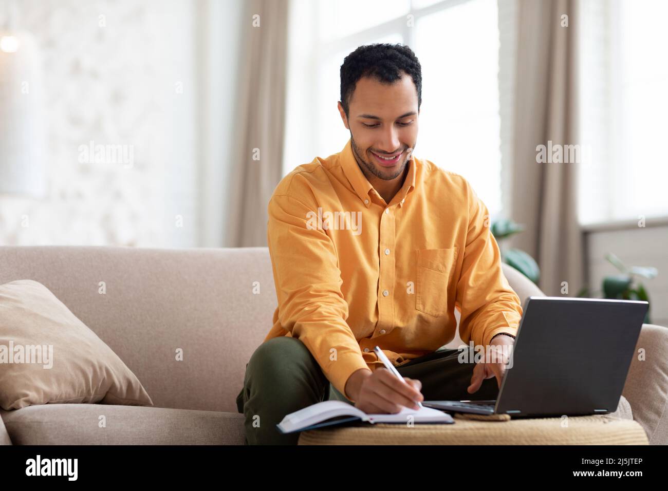 Arab student writing hi-res stock photography and images - Alamy