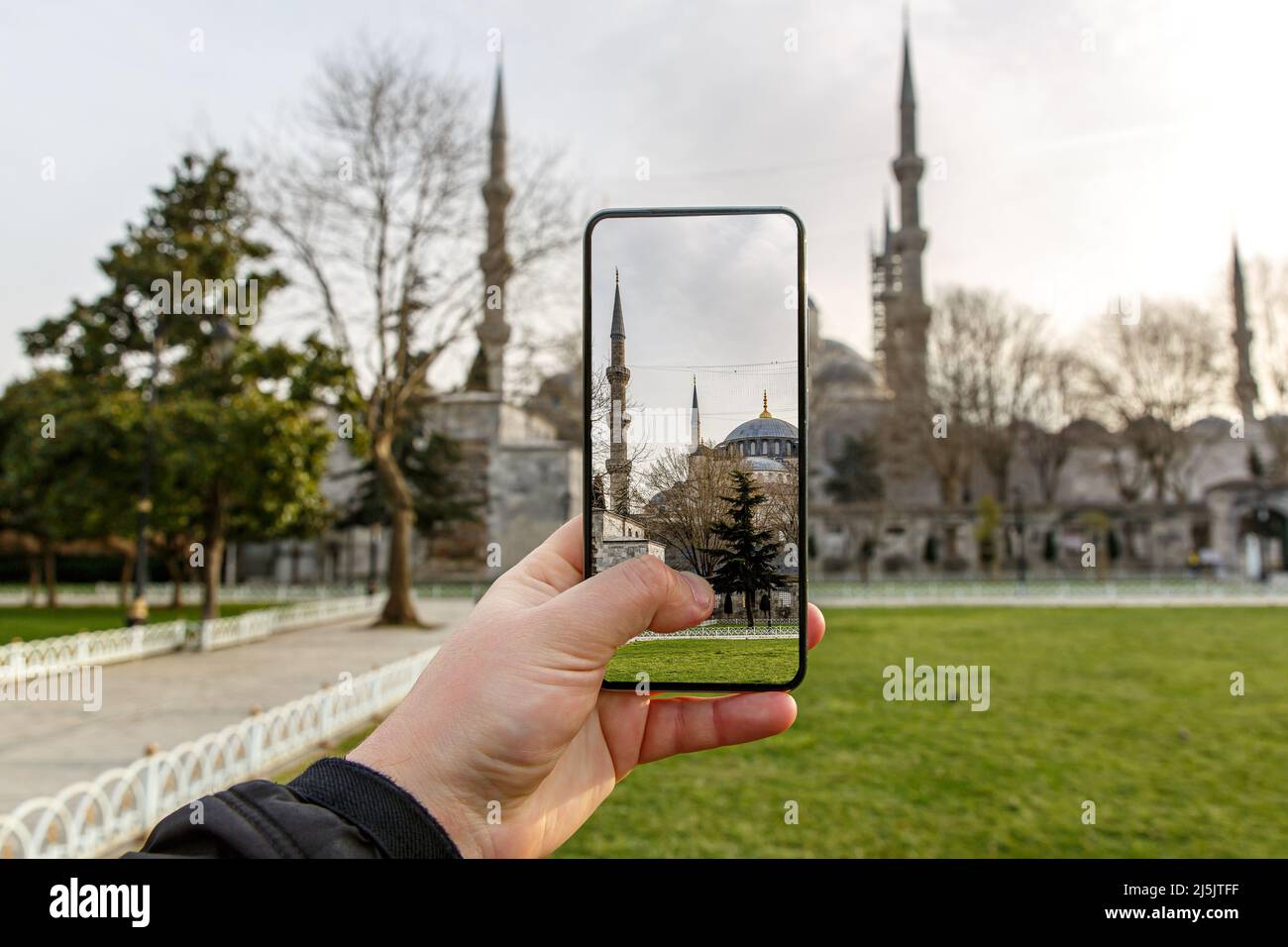 Taking photos of Istanbul, Turkey using a smartphone camera. Blue ...