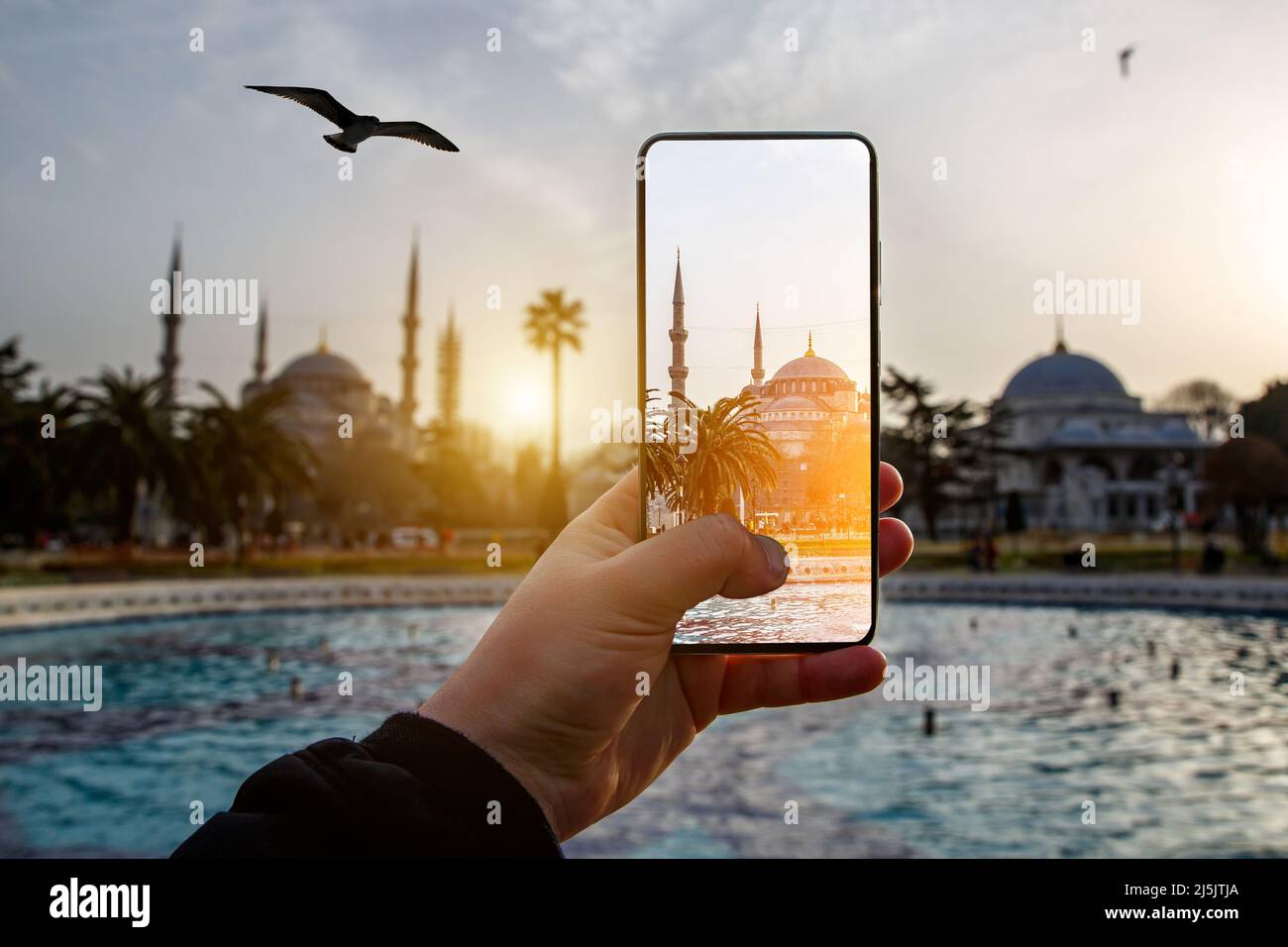 Taking photos of Istanbul, Turkey using a smartphone camera. Blue ...