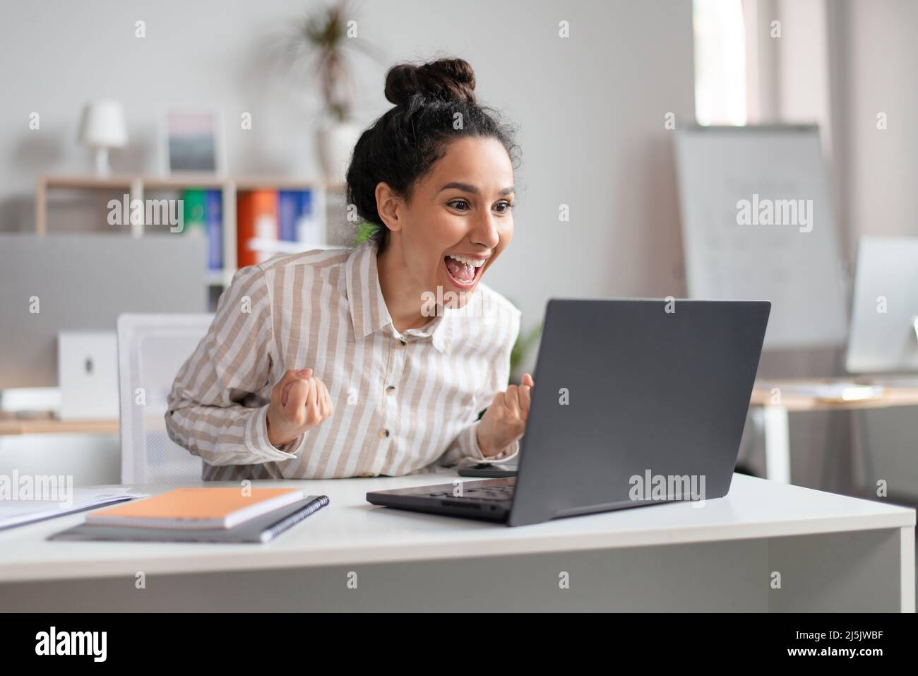 Excited office worker hi-res stock photography and images - Alamy