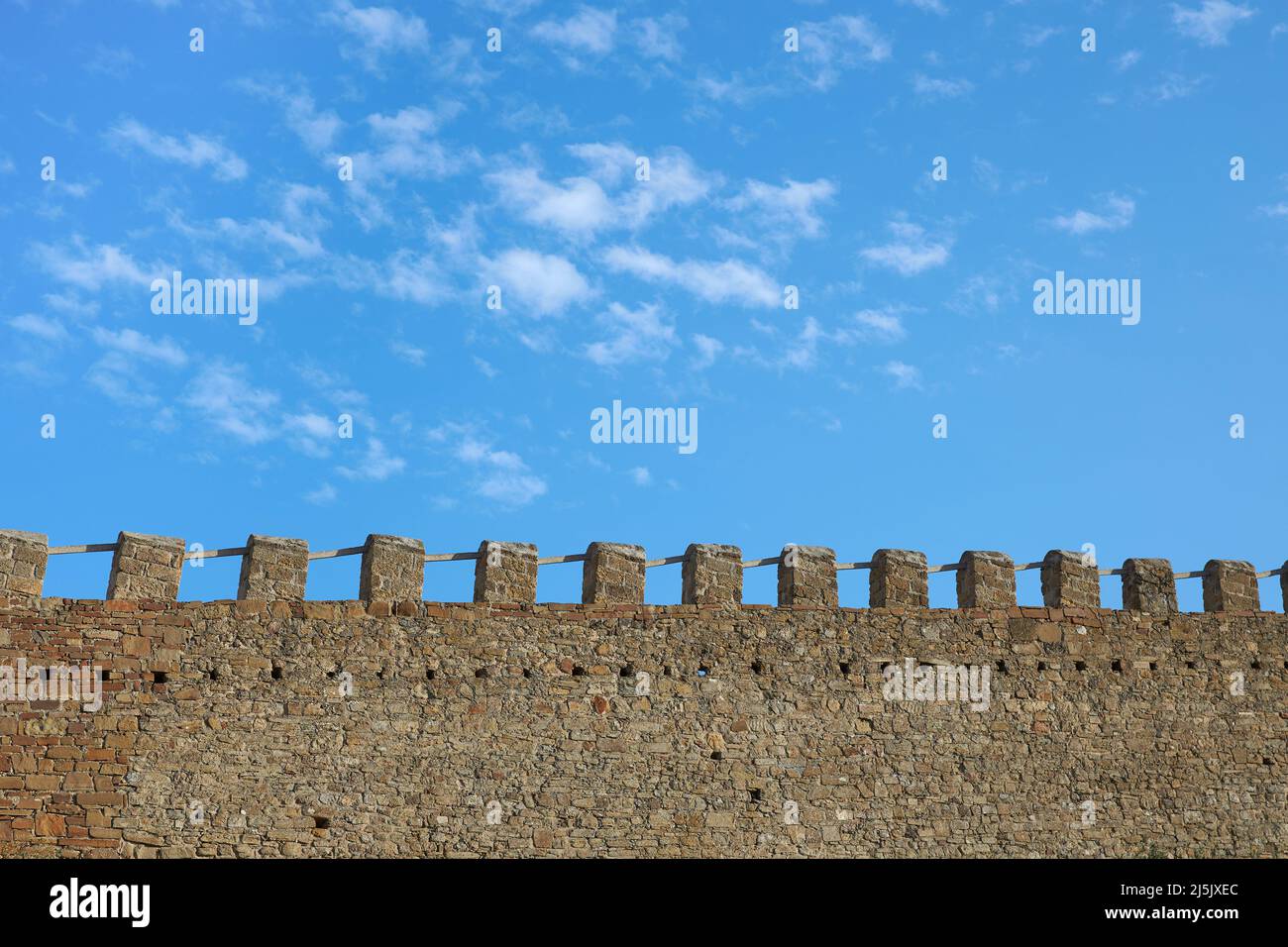 Wall of fortress and blue sky as background or backdrops Stock Photo ...