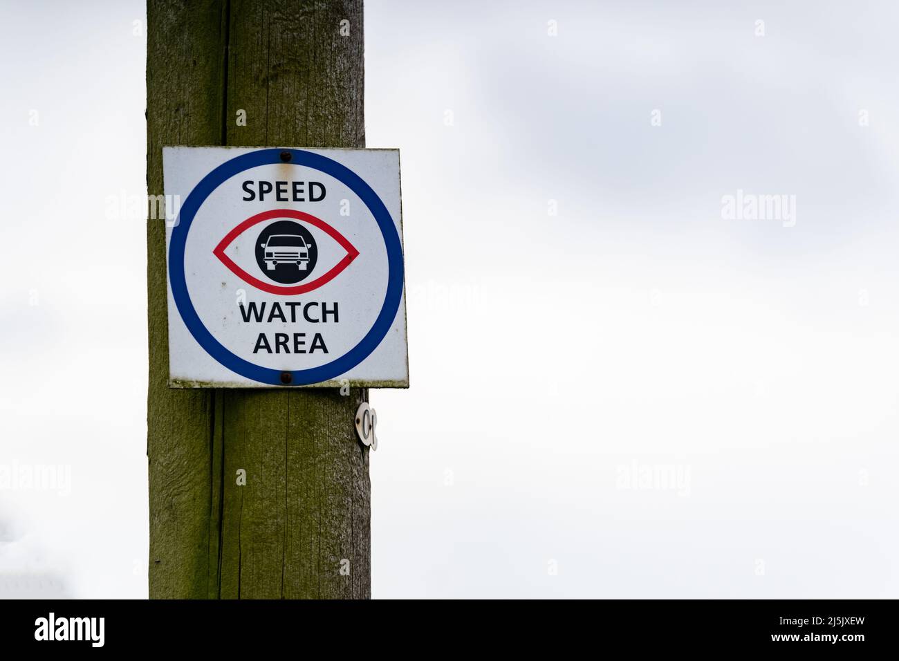 Speed watch area sign in a small Suffolk village warning drivers not to ...