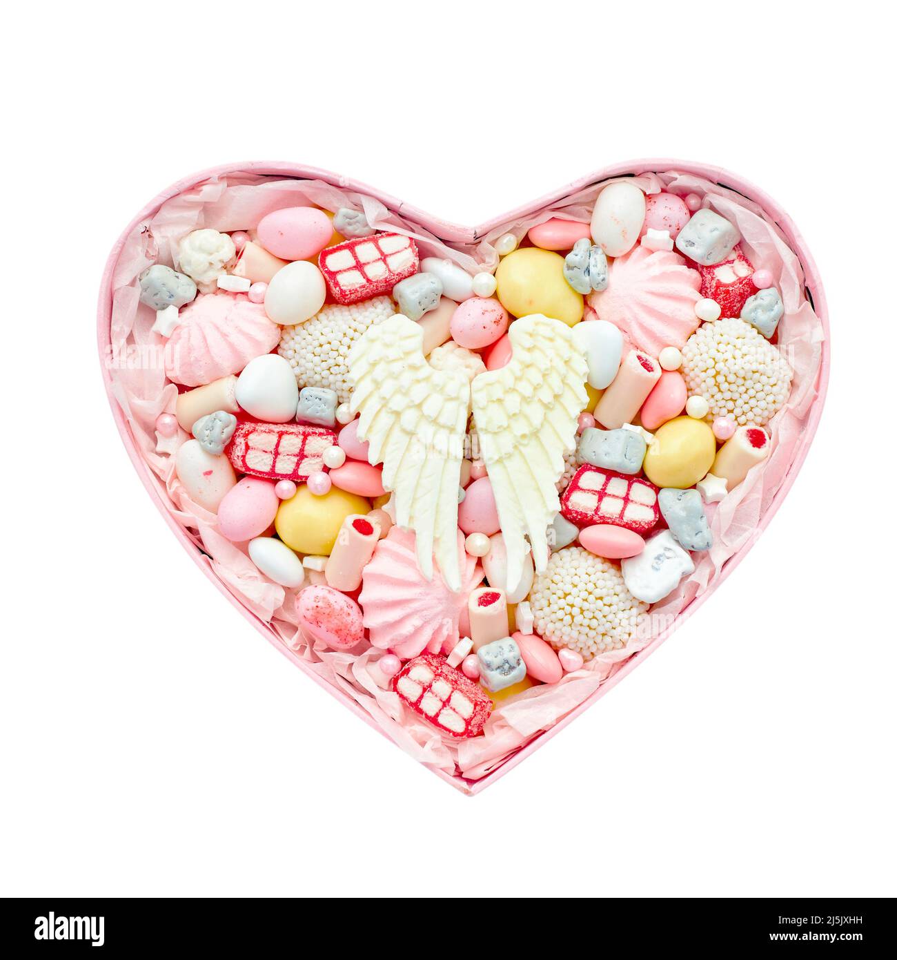 Pink heart-shaped box filled with sweets on a white background Stock ...