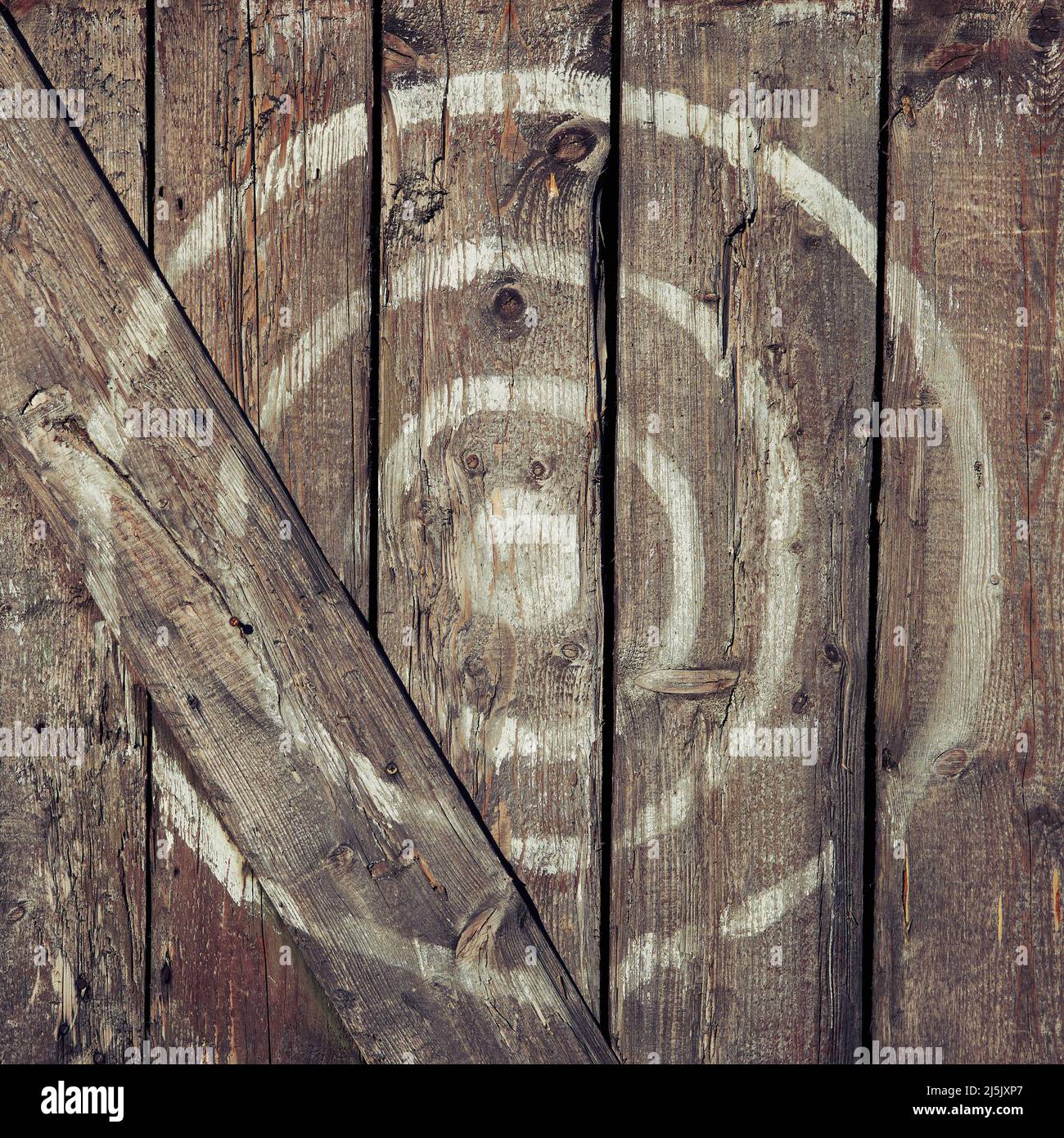 Circular target is drawn with white paint on a wooden door Stock Photo ...
