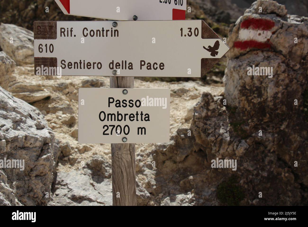 The view of Passo Ombretta signpost and trekking signs. Veneto, Italy ...