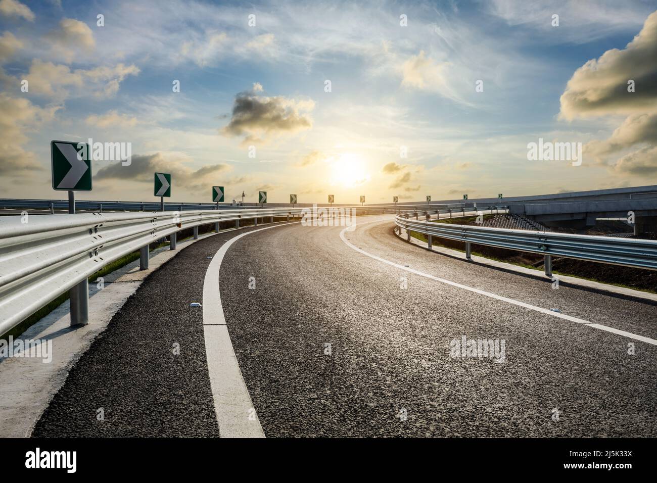 Asphalt highway and beautiful sky cloud landscape at sunset. Road and ...