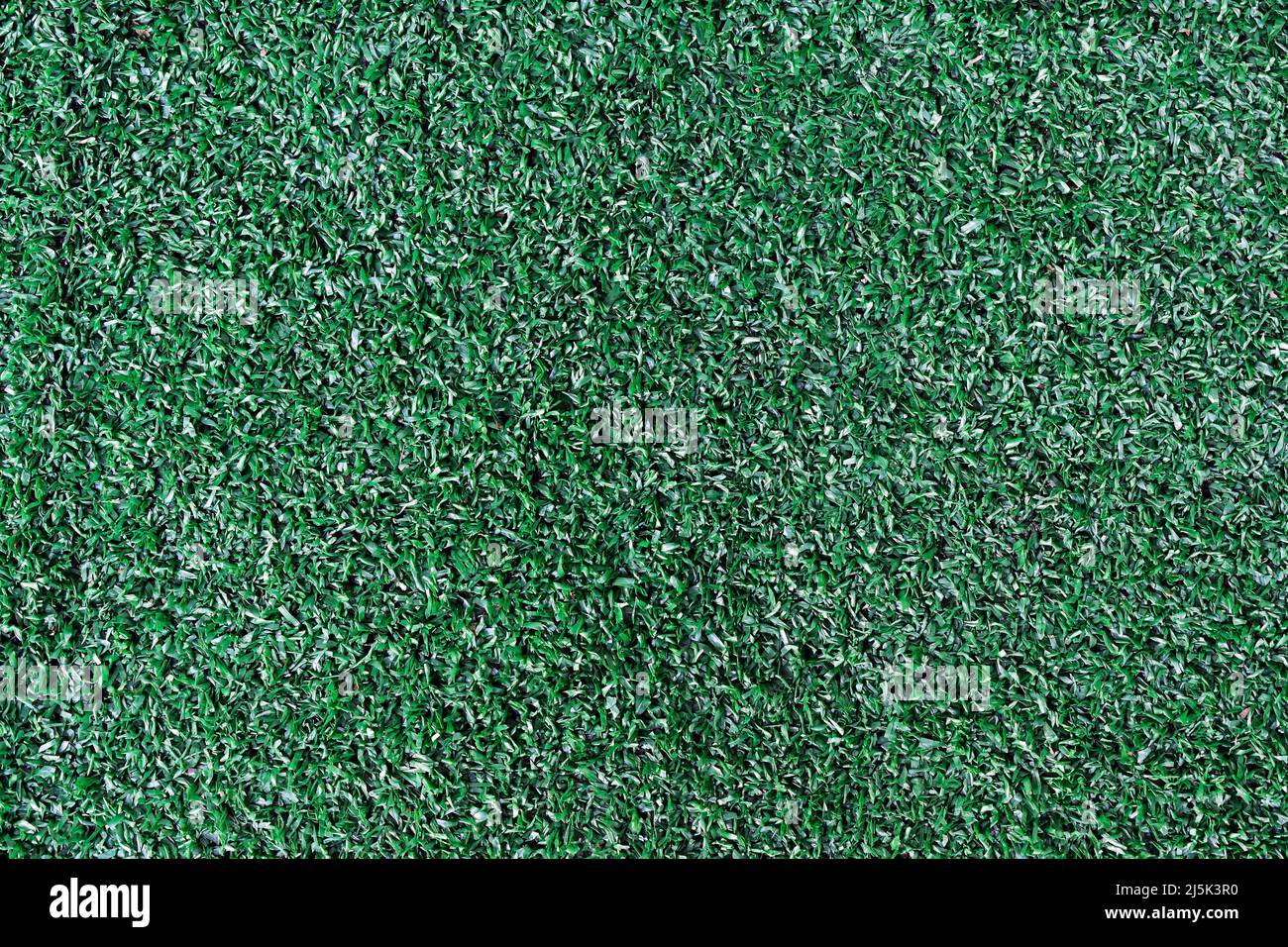 Synthetic artificial grass texture background Stock Photo - Alamy