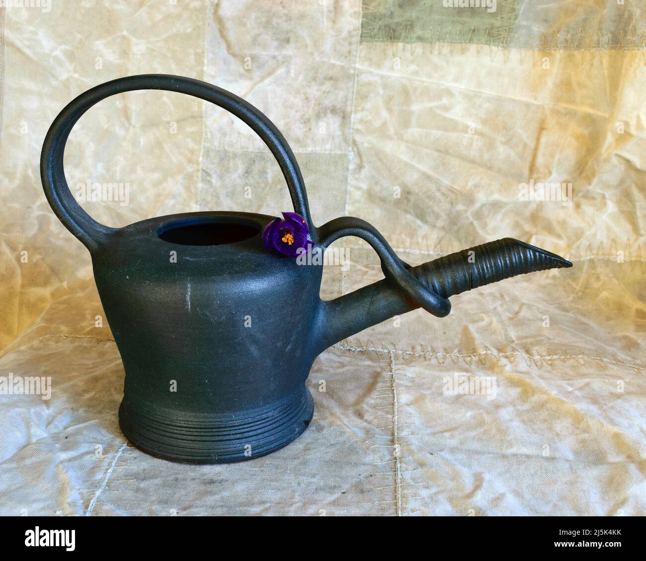 decorative clay mug, crumpled fabric background, handmade, still life ...