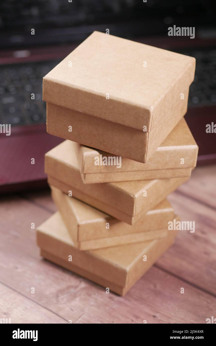 Stack cardboard parcels laptop on hi-res stock photography and images ...