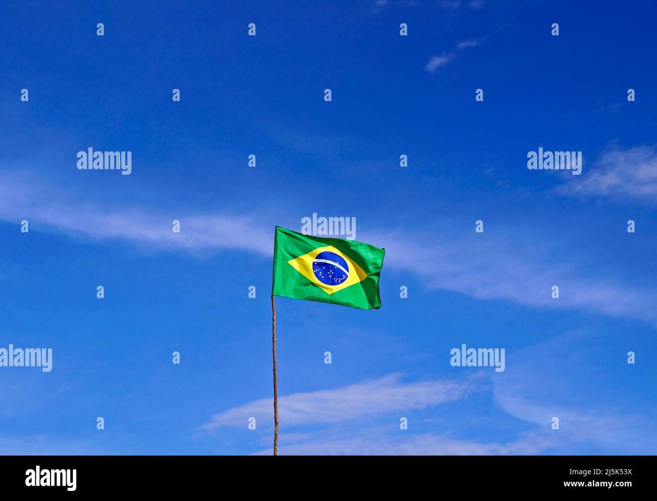 Brazilian Flag and blue sky, Rio Stock Photo - Alamy