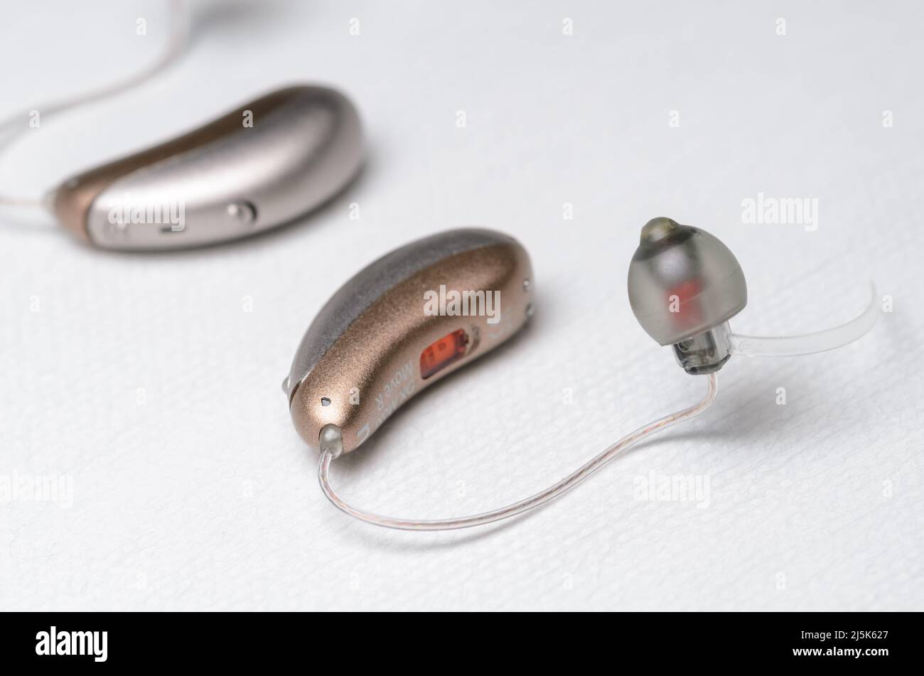 Modern hearing aid on white background Stock Photo - Alamy