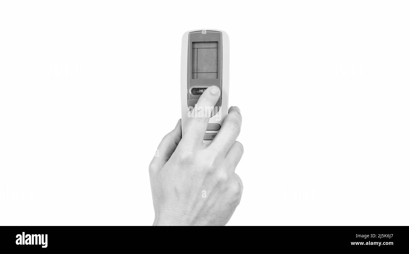 hand pressing button on remote control isolated on white, controlling ...