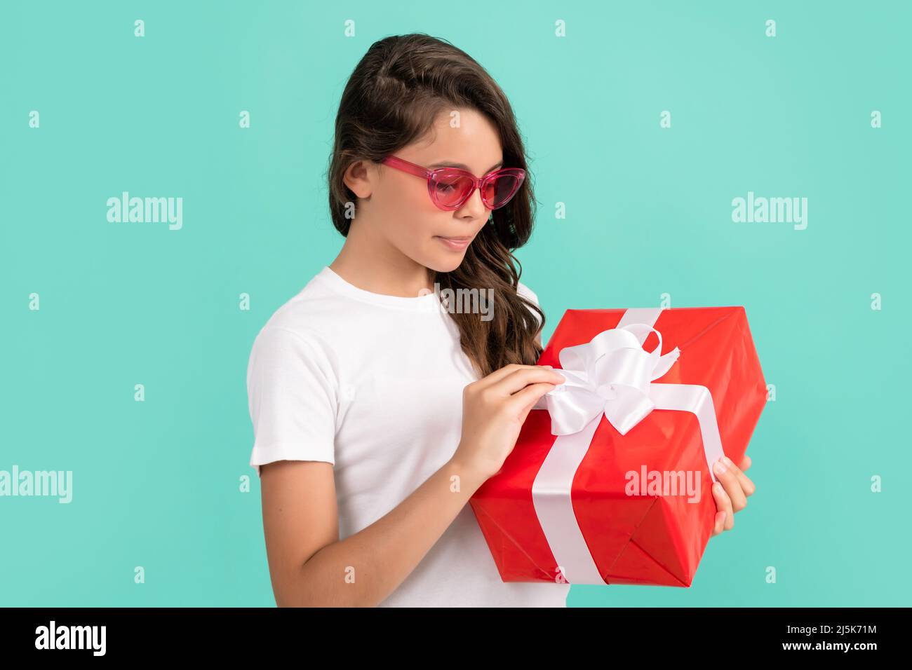 curious kid open present. child prepare for holiday. happy valentines ...