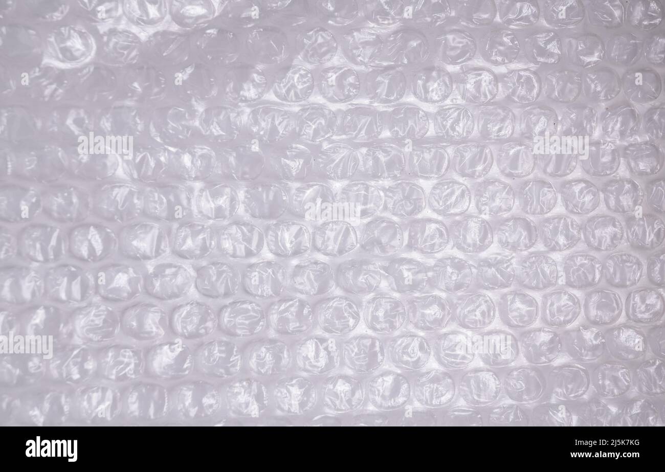 Bubble wrap on white background Stock Photo - Alamy