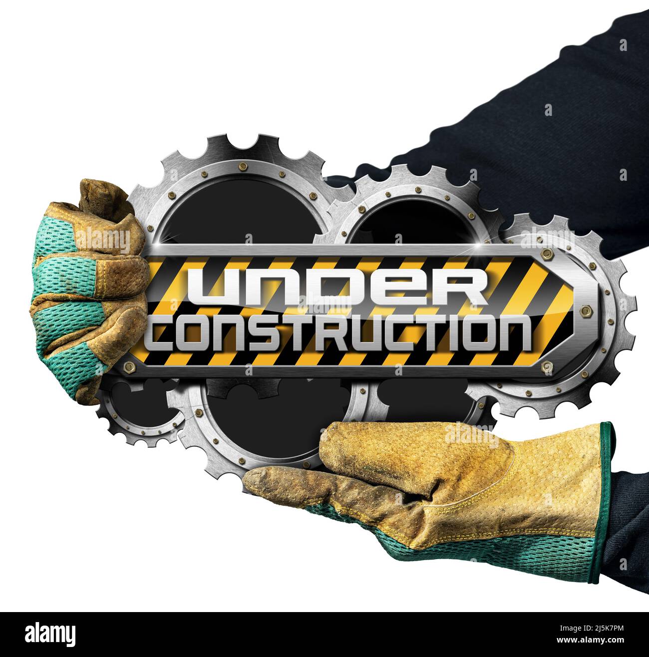 Gloved hand holding an under construction sign with metal cogwheels ...