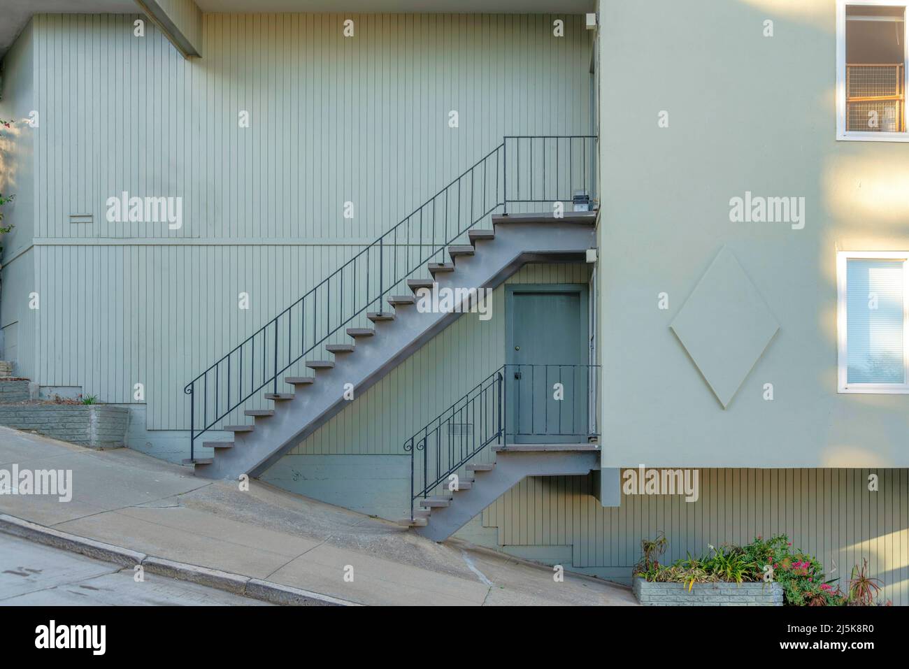 Two-storey apartment building with two staircase entrance at San ...