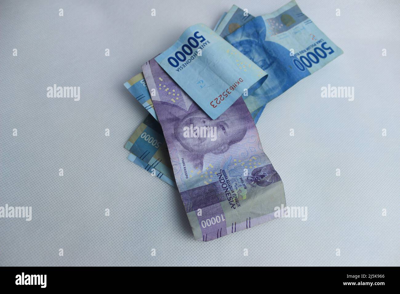 Indonesian Rupiah Money 50 000 And 10 000 IDR Banknotes Top View Stock Indonesian Rupiah Money 50 000 And 10 000 IDR Banknotes Top View Stock