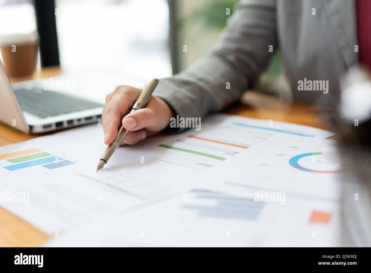 Business analyst concept the data analyst calculating the diagrams ...