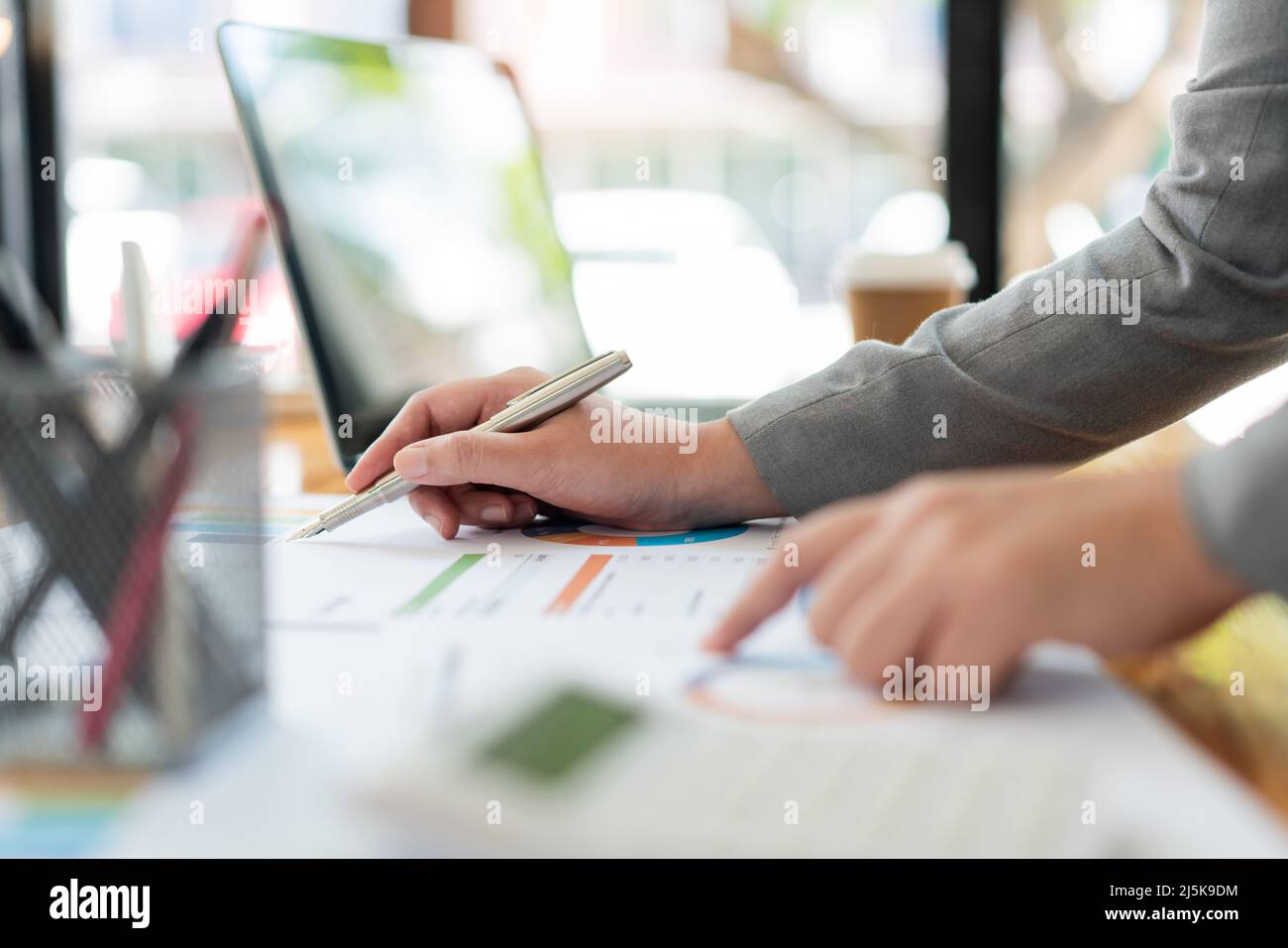 Business analyst concept the data analyst calculating the diagrams ...