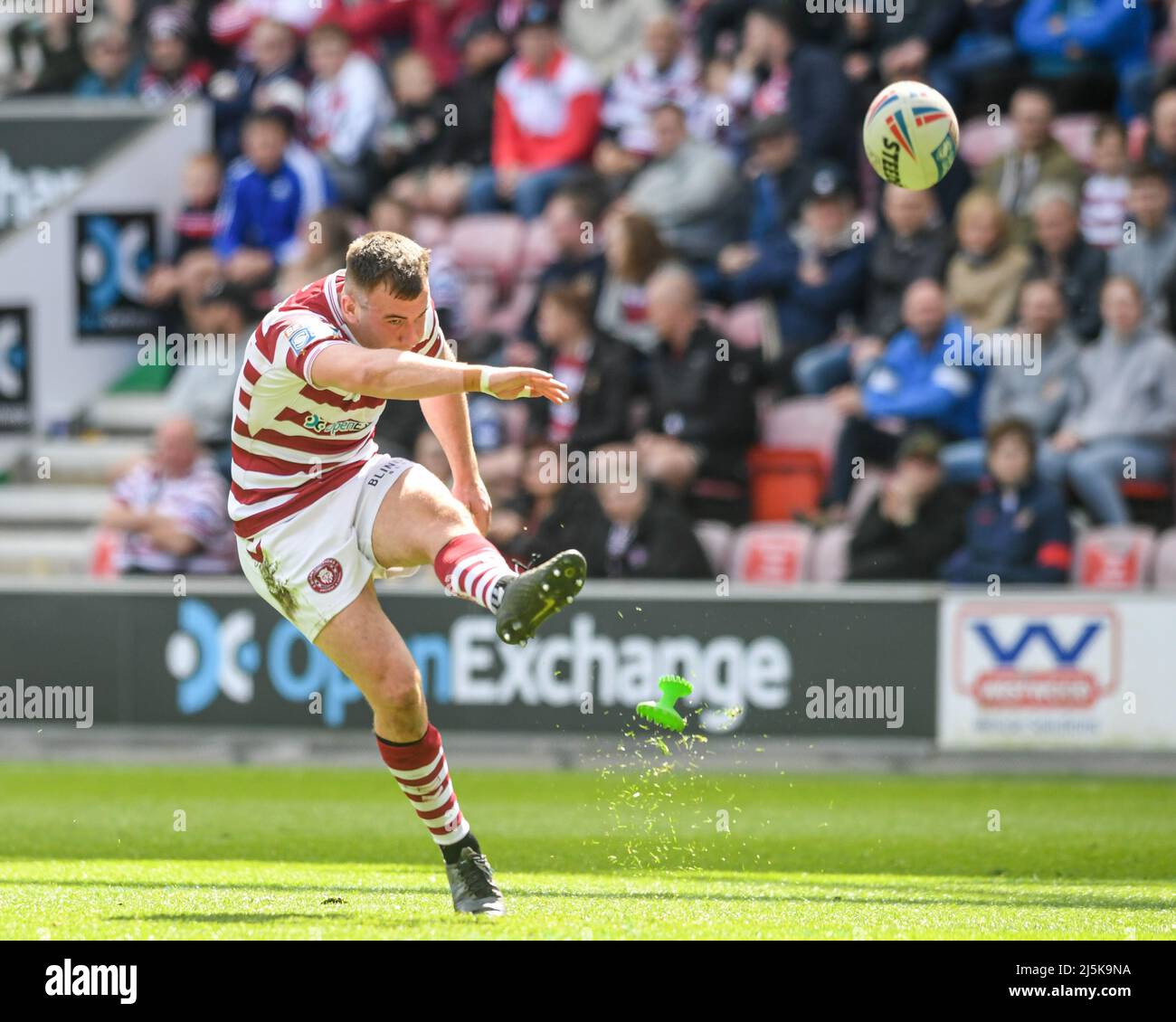 Harry Smith #16 of Wigan Warriors successfully kicks a conversion to ...