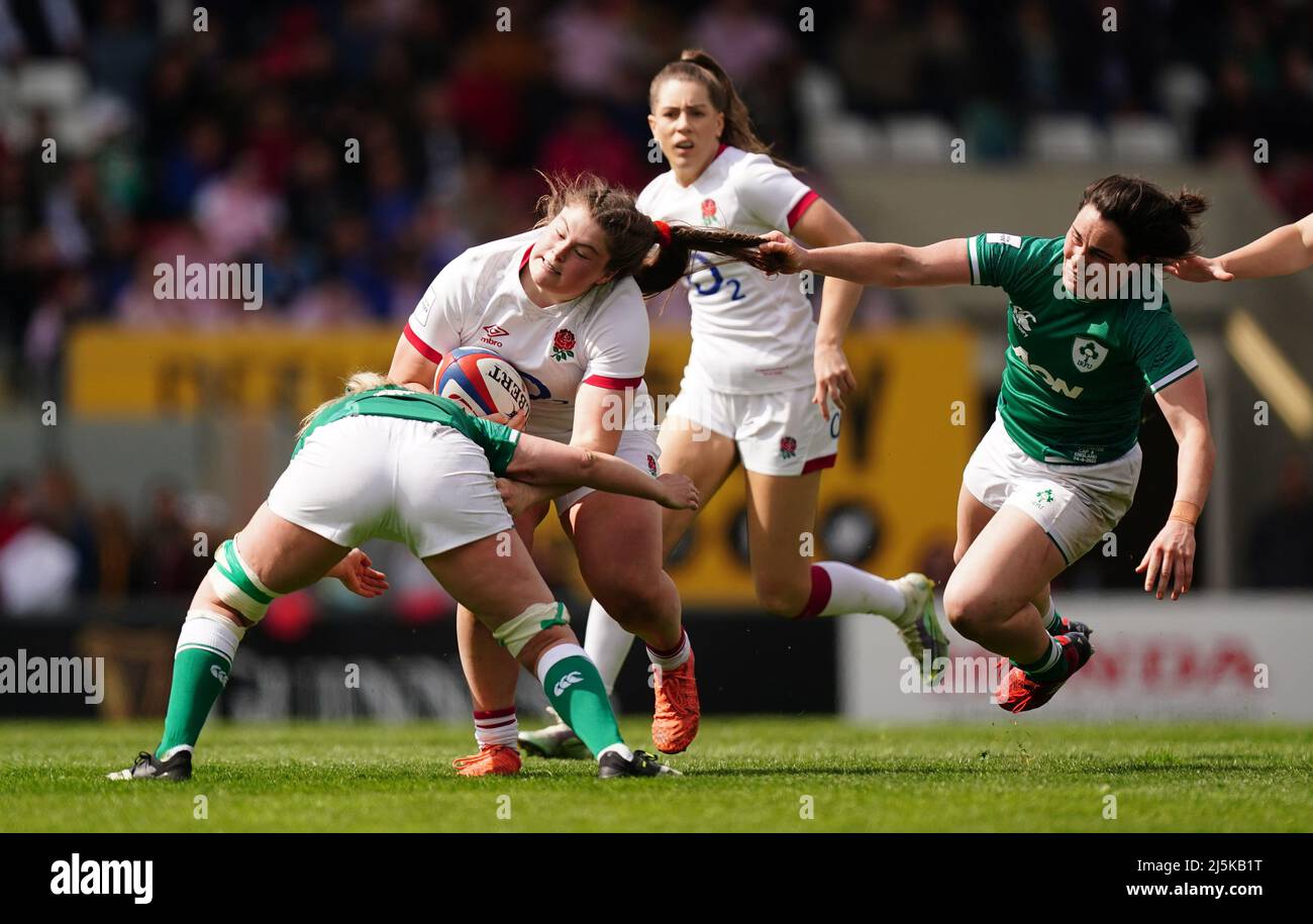 England's Maud Muir and Ireland's Katie O'Dwyer (right) in action ...