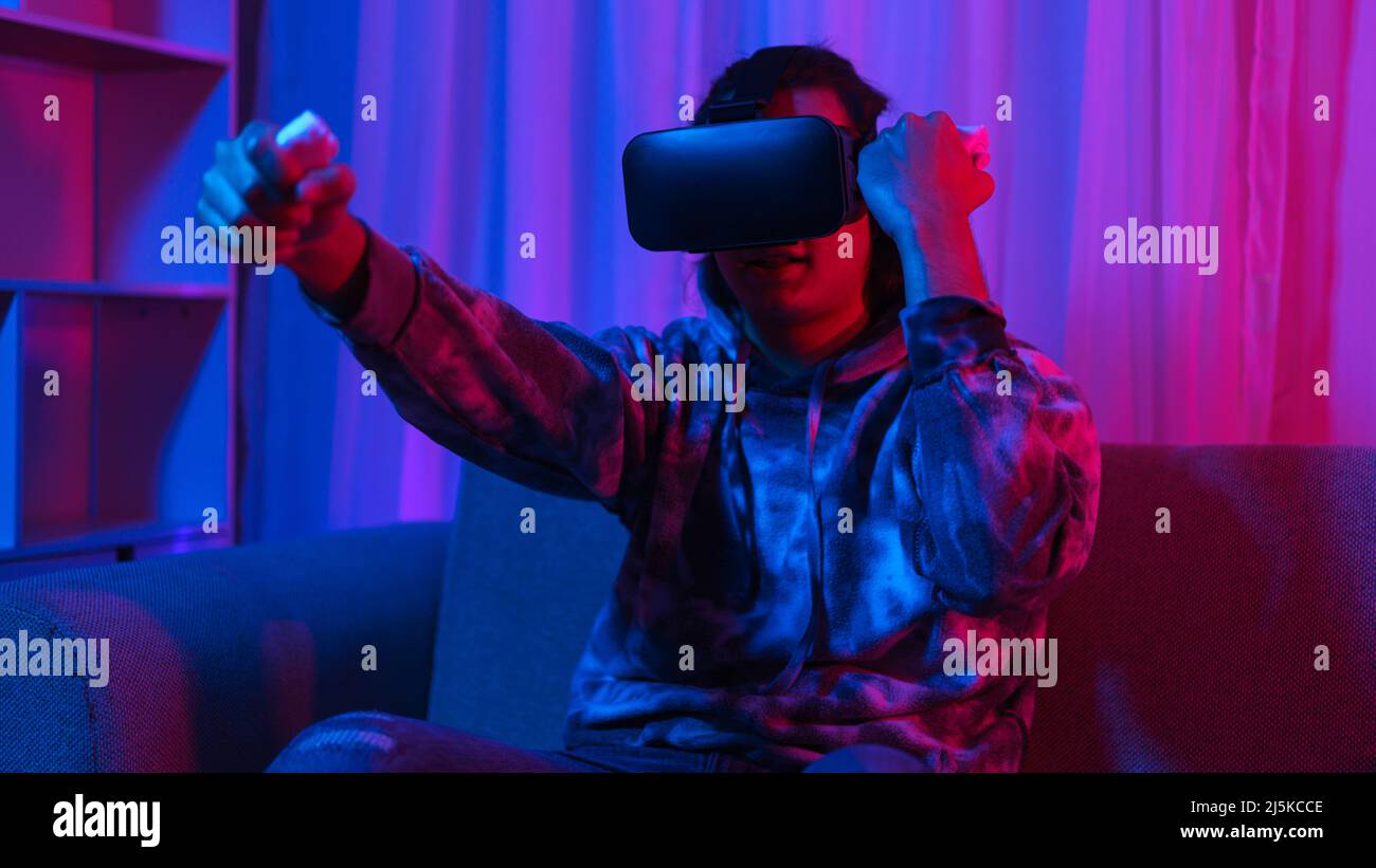 Metaverse technology concept, Man wear VR goggles and have fun to play ...