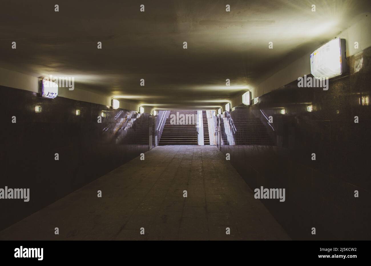An empty underpass with stairs. Monochrome image Stock Photo - Alamy