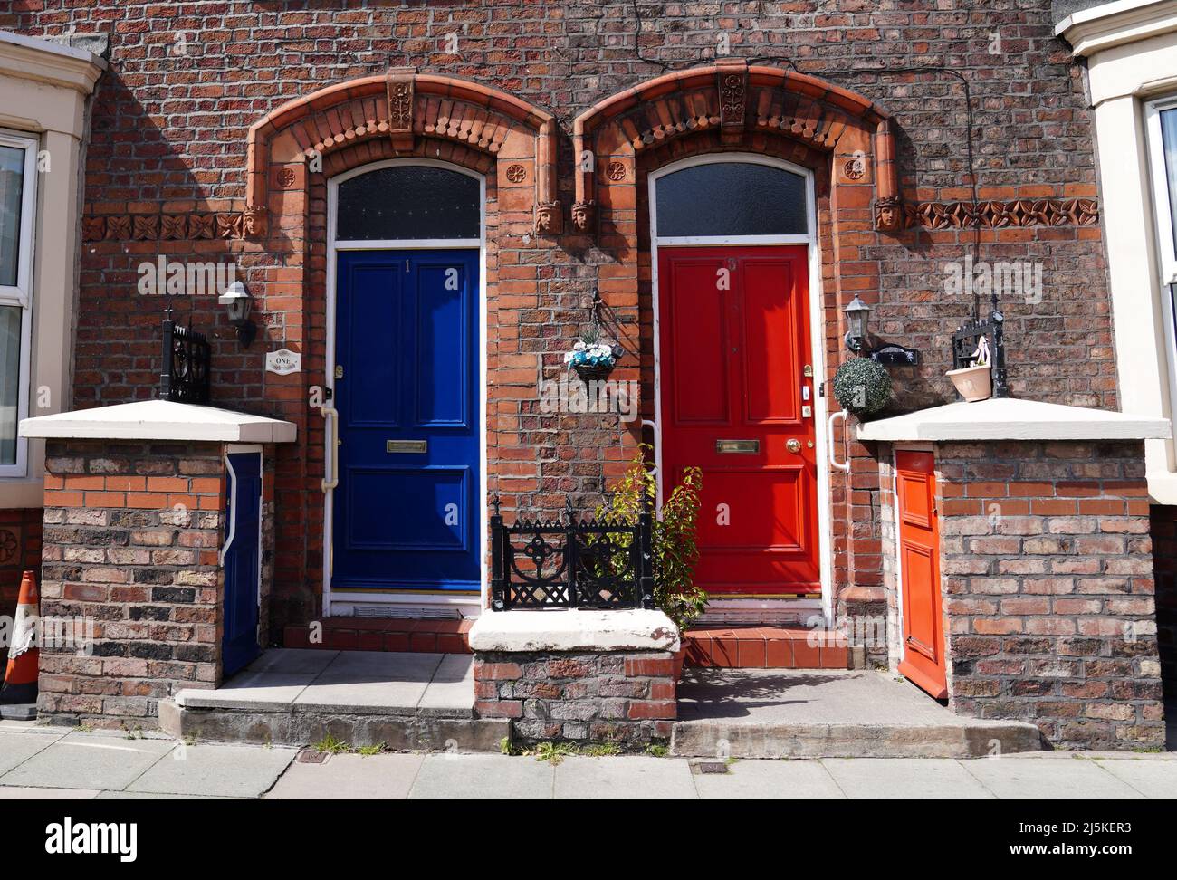 A blue door next to a red door before the Premier League match at ...
