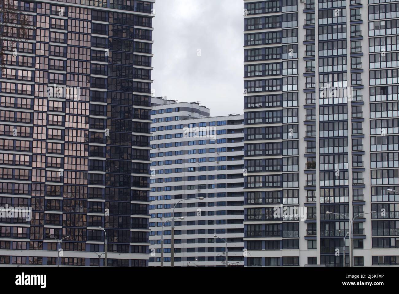 Construction of multi-storey buildings. Modern multi-storey building. Houses built of concrete ...