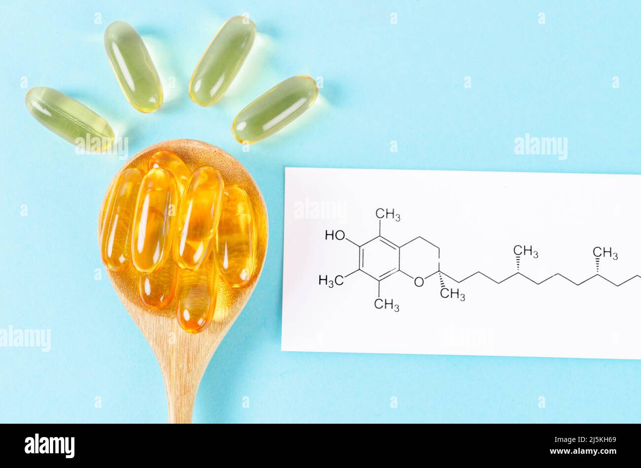 The Fish oil capsules and chemical formula on blue background Stock ...