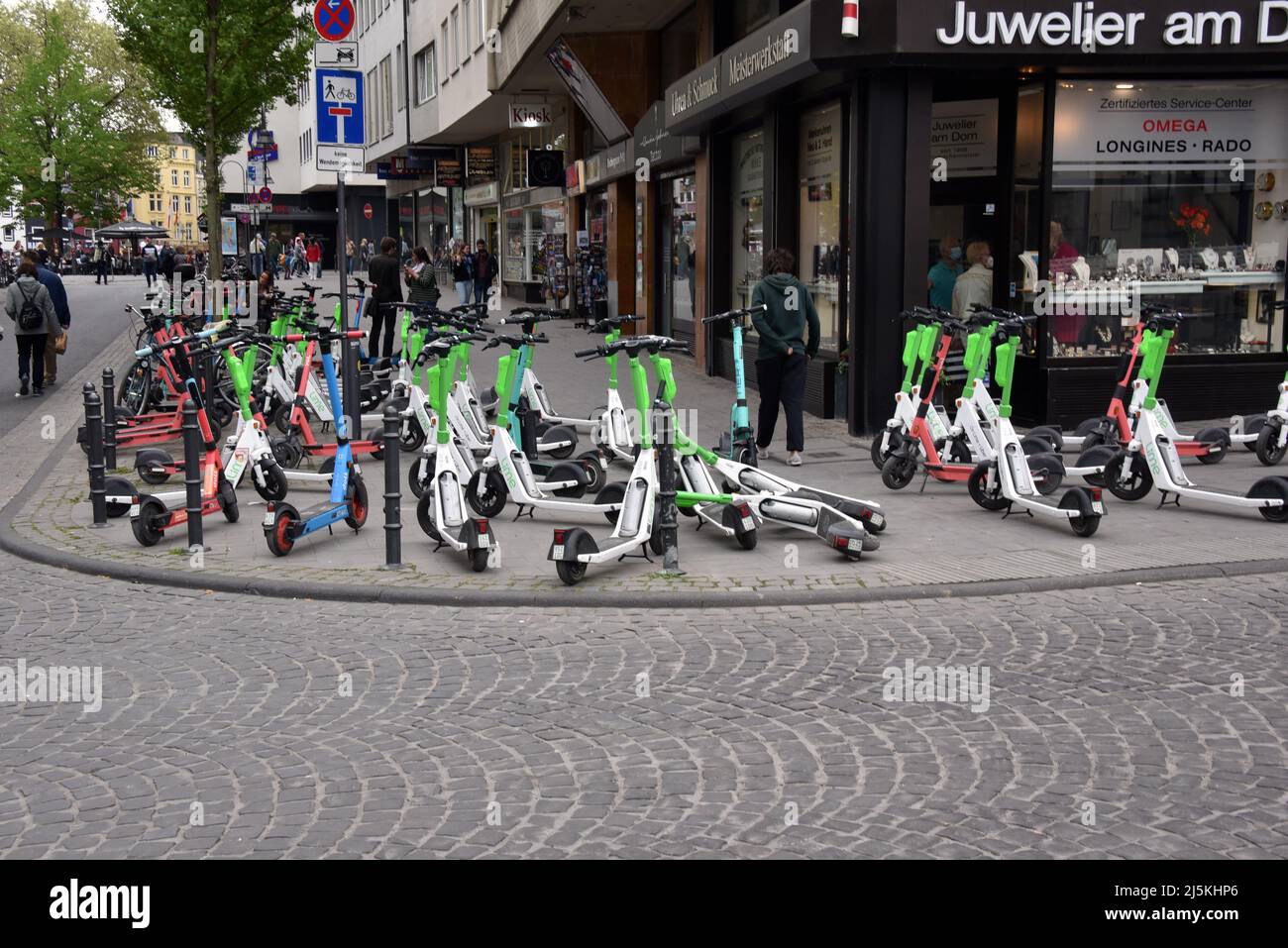 Cologne, Germany. 23rd Apr, 2022. Many electric rental scooters from ...