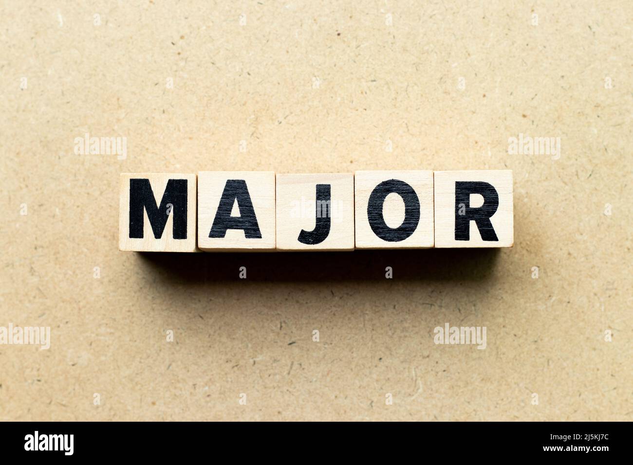 Alphabet letter block in word major on wood background Stock Photo - Alamy