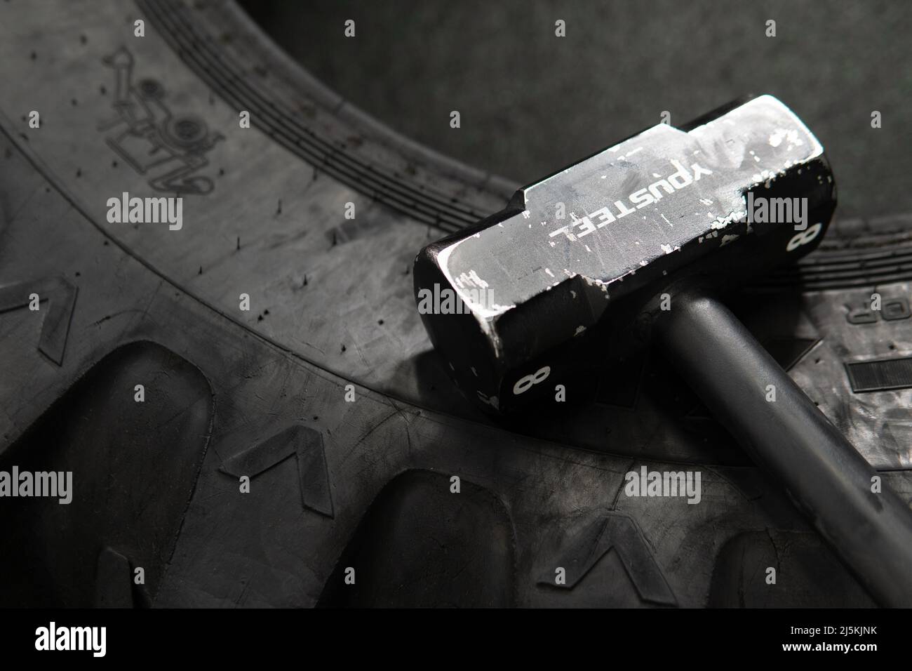 Tire wheel sledgehammer black crossfit workout athlete heavy fitness ...