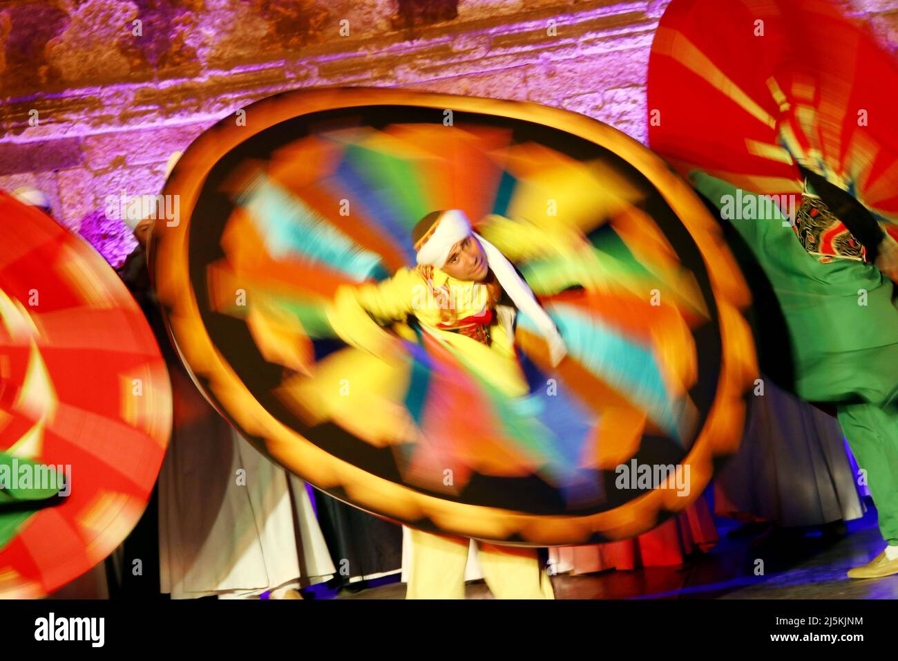 Cairo, Egypt. 23rd Apr, 2022. People watch Tanoura, a traditional ...