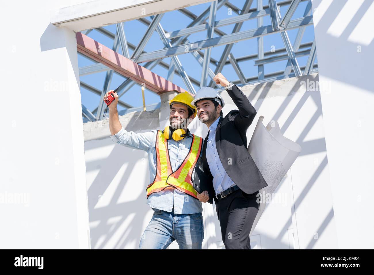 Engineer with businessman are planning construction in construction ...