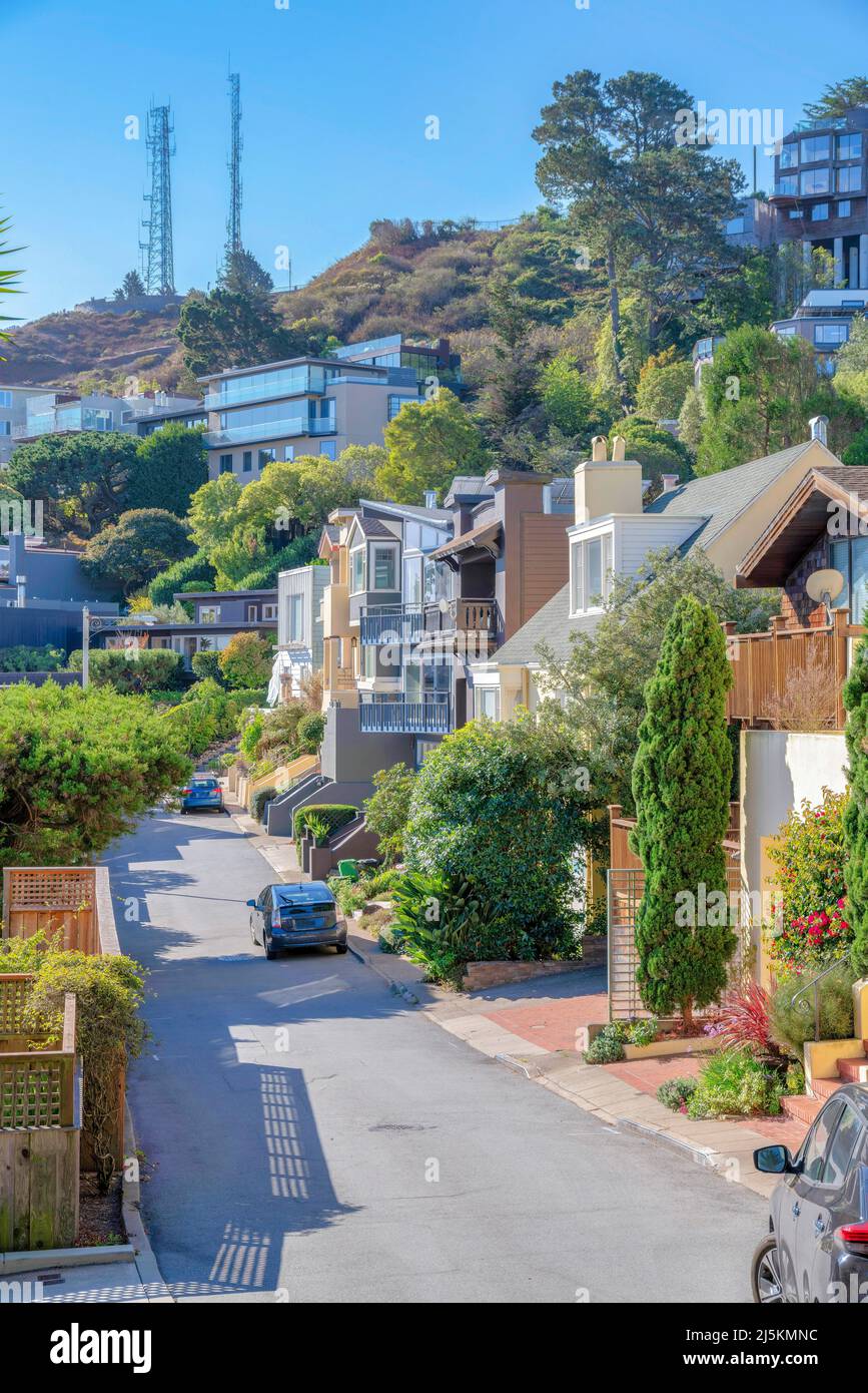 Concrete uphill road in a residential area on a slope at San Francisco ...