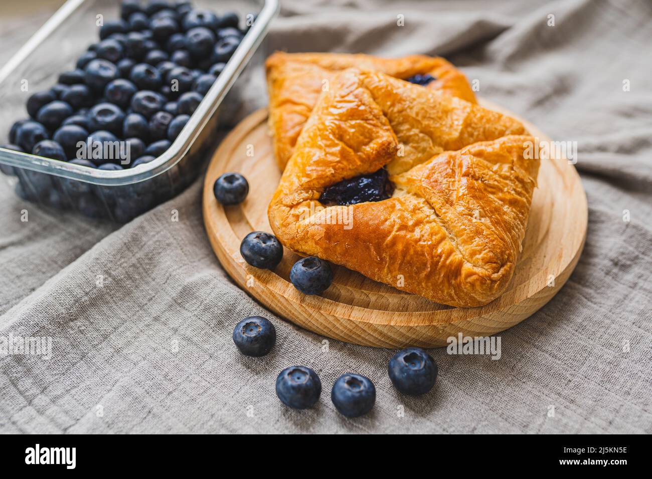 Puff pastry pockets filled with jam. Puff pastry pockets stuffed with ...