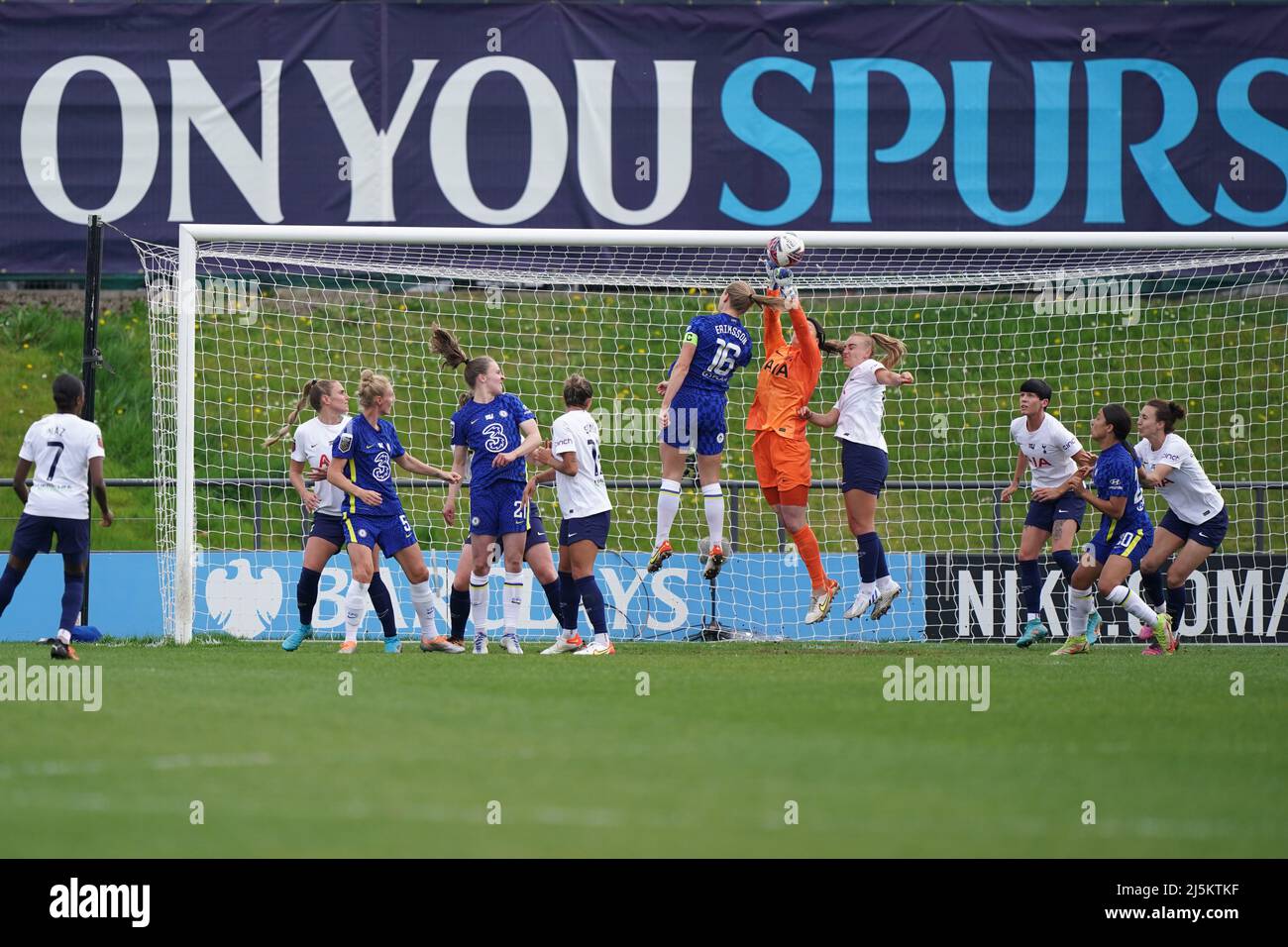 Tottenham goalkeeper Tinja-Riikka Korpela (centre right) tips the ball ...