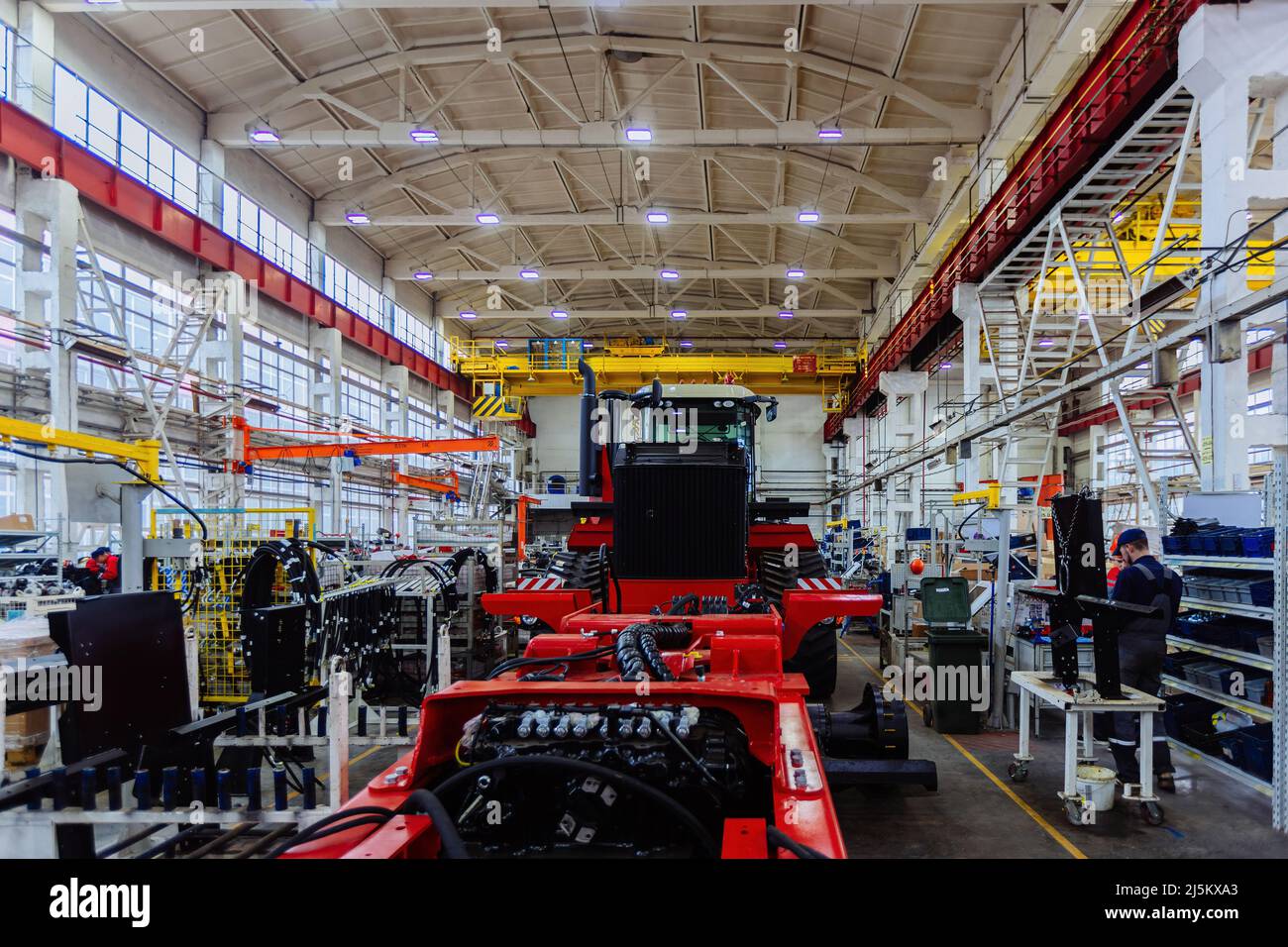 Assembly process of agricultural tractors in industrial workshop Stock ...