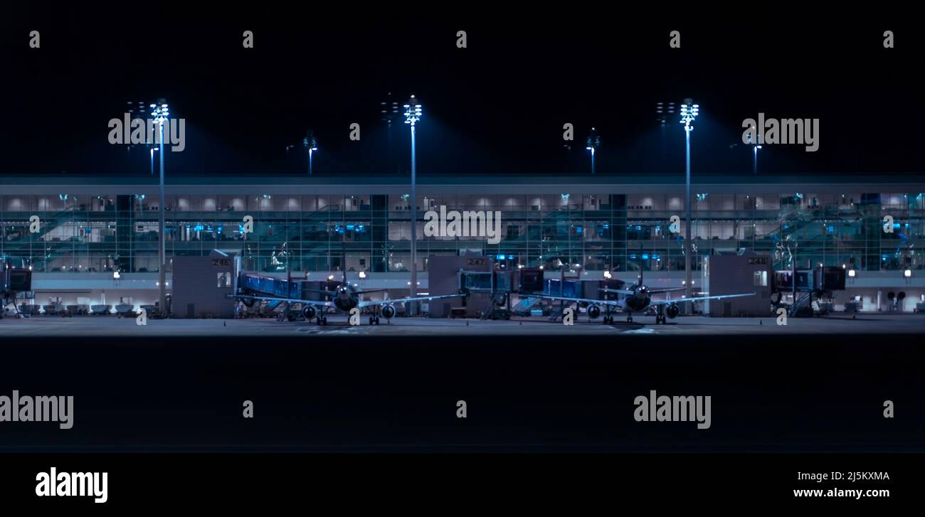 Airport at night where no flights are allowed.Planes are waiting for ...