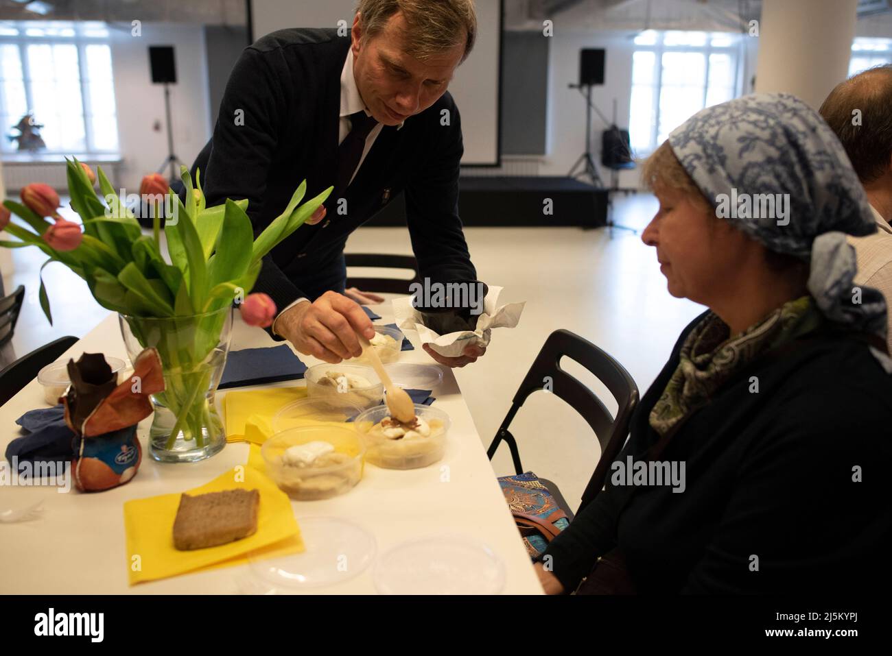 Warsaw, Poland, Poland. 24th Apr, 2022. A man serves pierogi dumplings ...